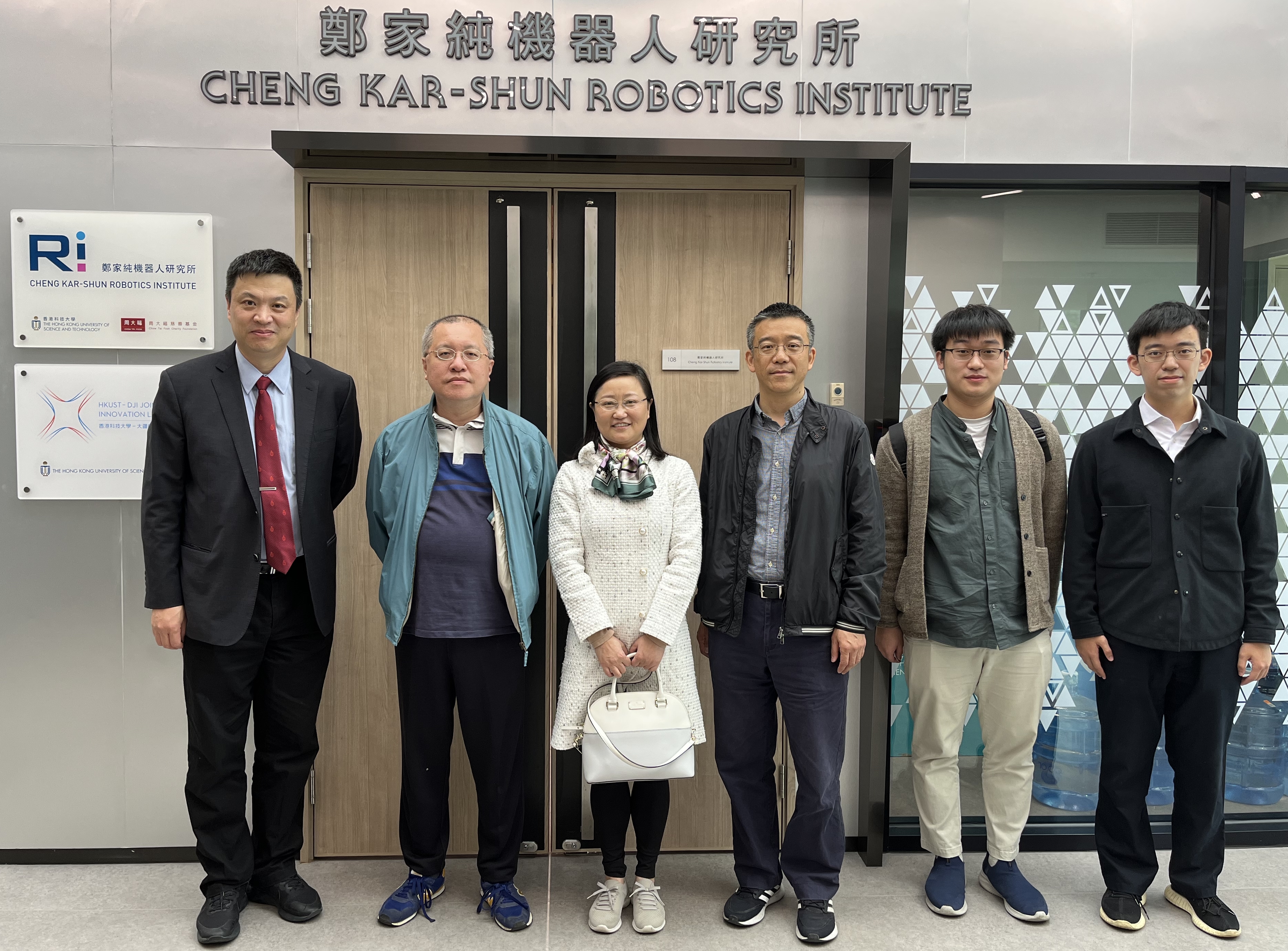 Dr. CHAN Pak Wai, JP, Director of the Hong Kong Observatory, and Mr. Xu Chen, Executive Vice ...